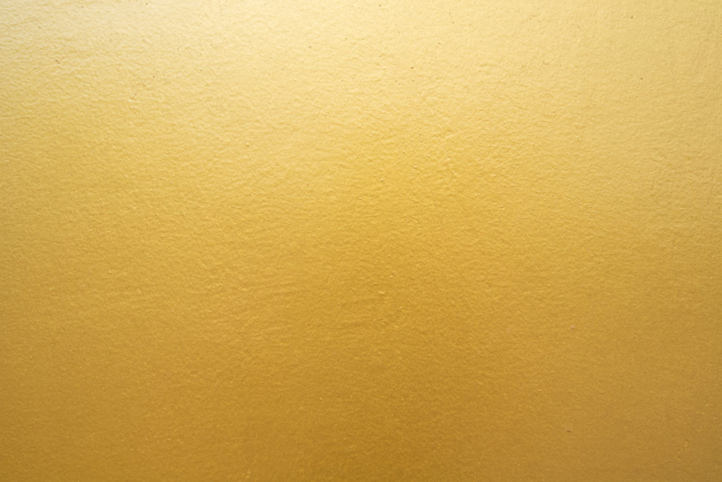 Gold concrete wall on background texture. – Coptic Literacy